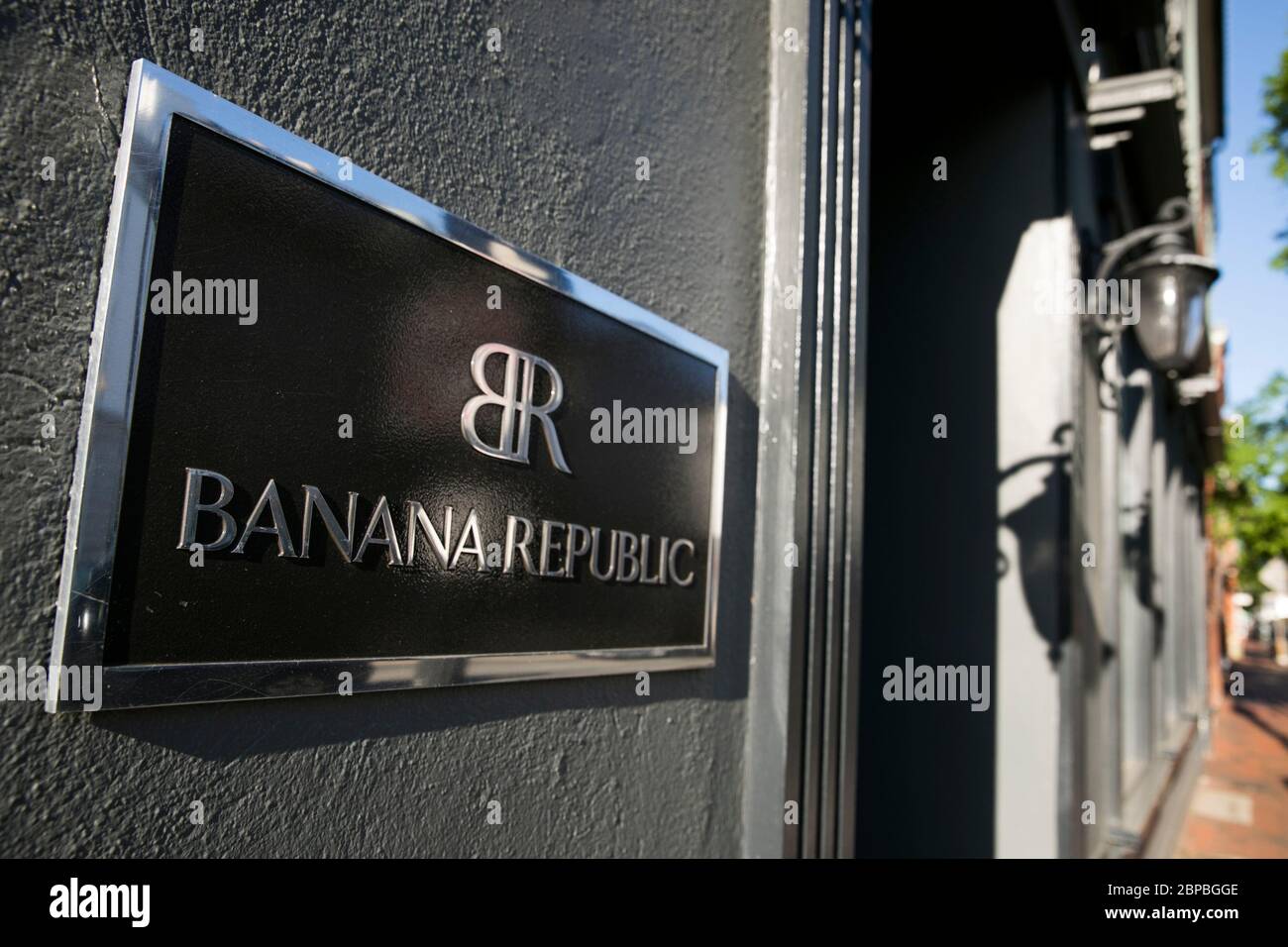 A logo sign outside of a Banana Republic retail store location in ...
