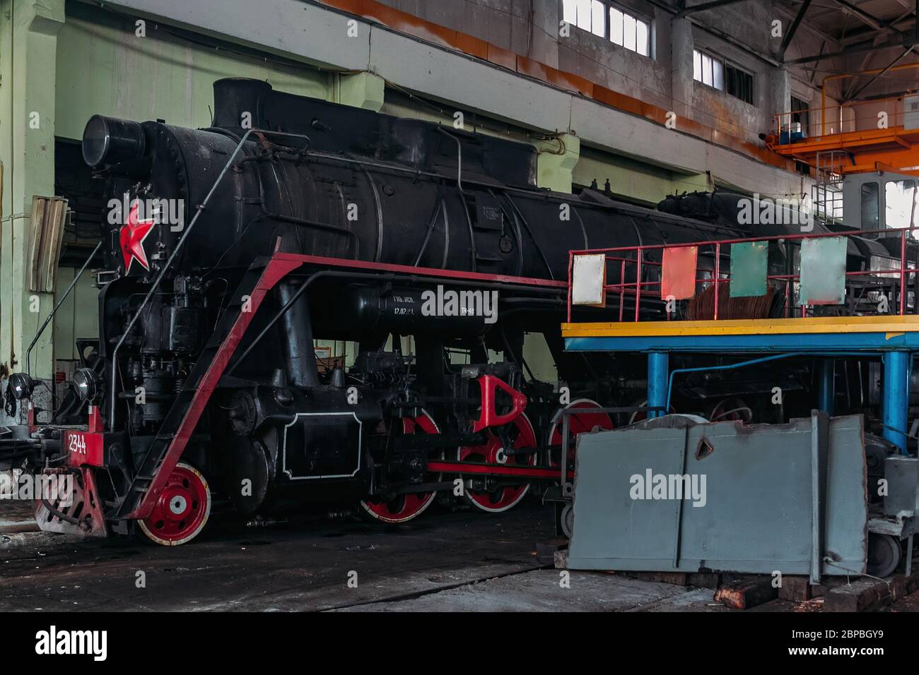 Old Soviet steam locomotive at the train depot Stock Photo - Alamy