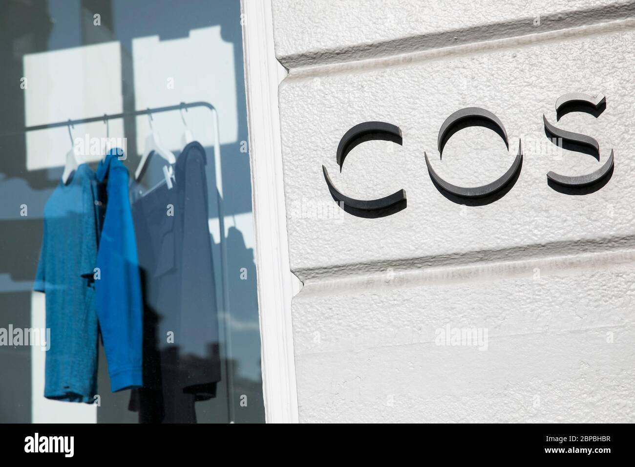 A logo sign outside of a COS retail store location in Washington, D.C ...