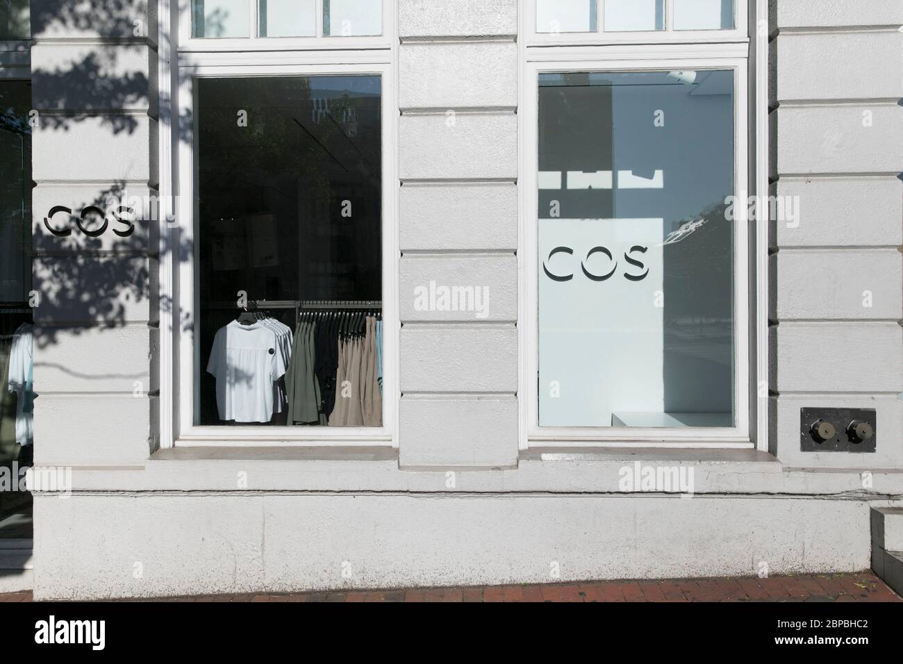 A logo sign outside of a COS retail store location in Washington, D.C ...