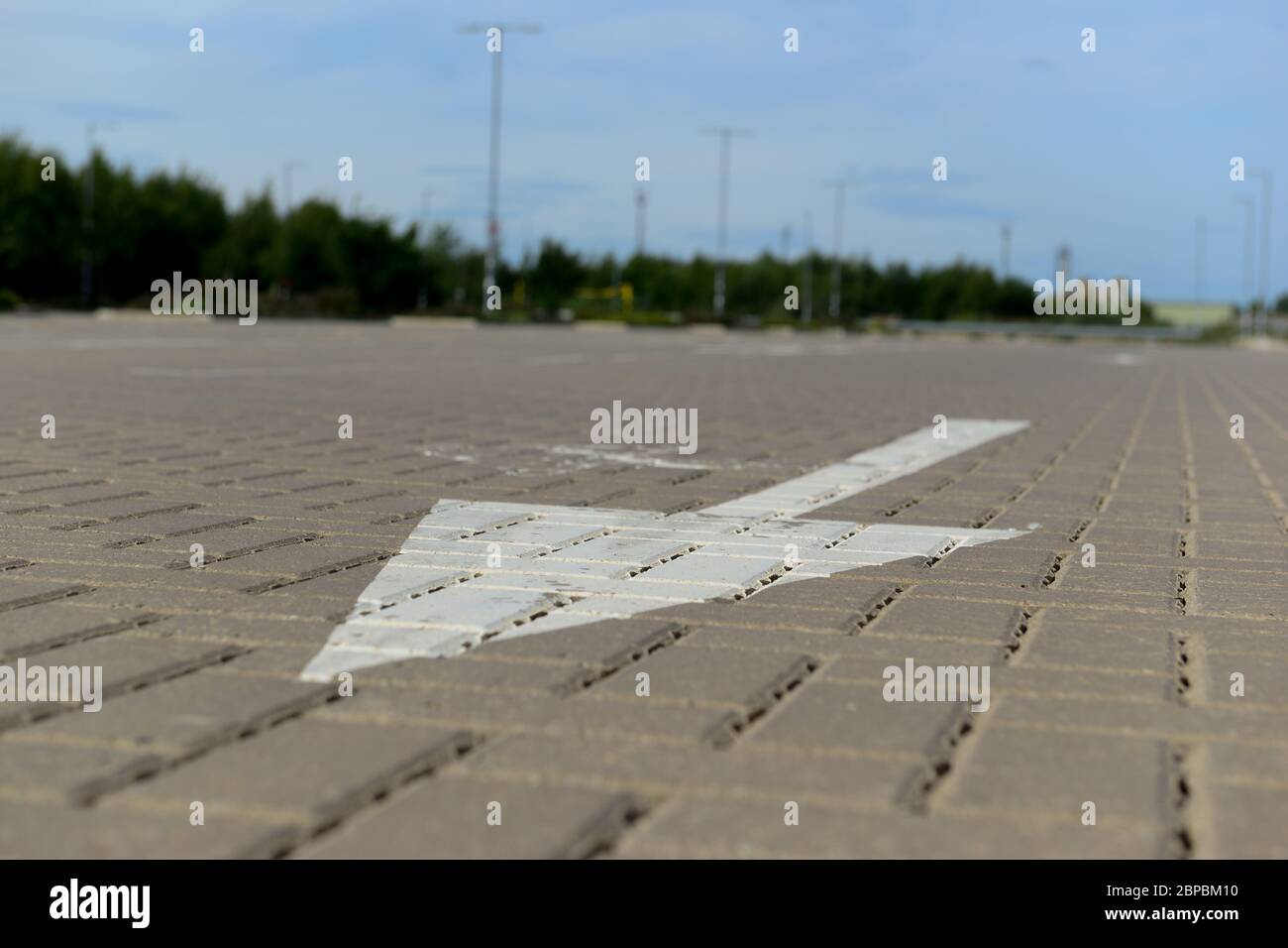 Pavement marking arrow hi-res stock photography and images - Alamy