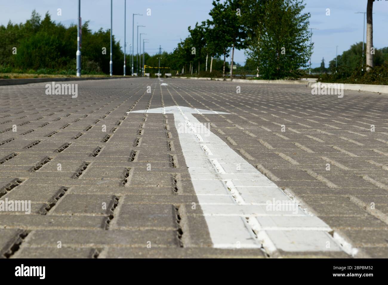 Pavement marking arrow hi-res stock photography and images - Alamy