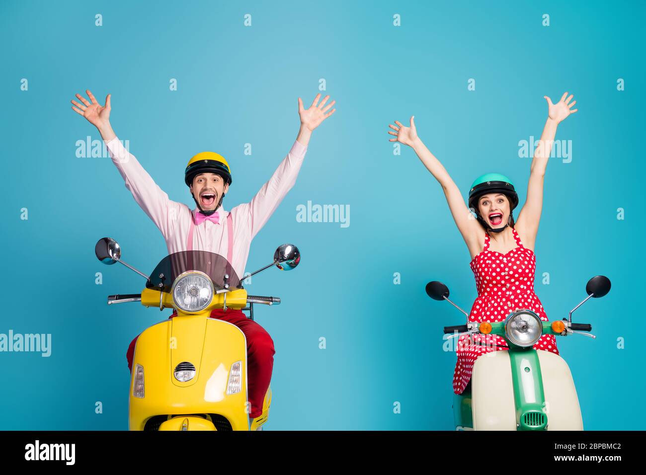 Portrait of positive energetic fellows man woman biker driver rider ...