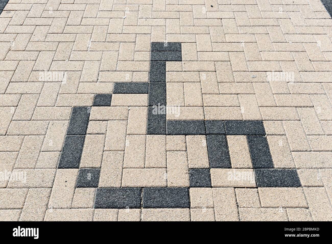 Block pavement stones used for road way and parking spaces with black ...