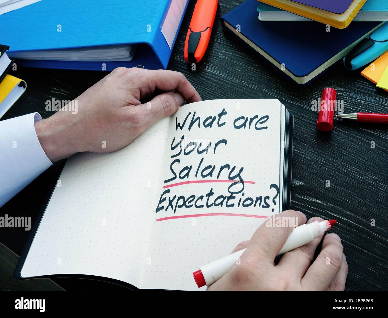 Handwritten Question what are your salary expectations Stock Photo - Alamy