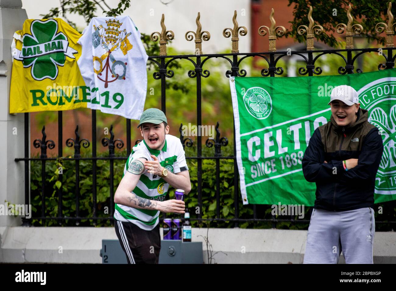 Celtic fans on the Falls Road in west Belfast celebrate their football ...