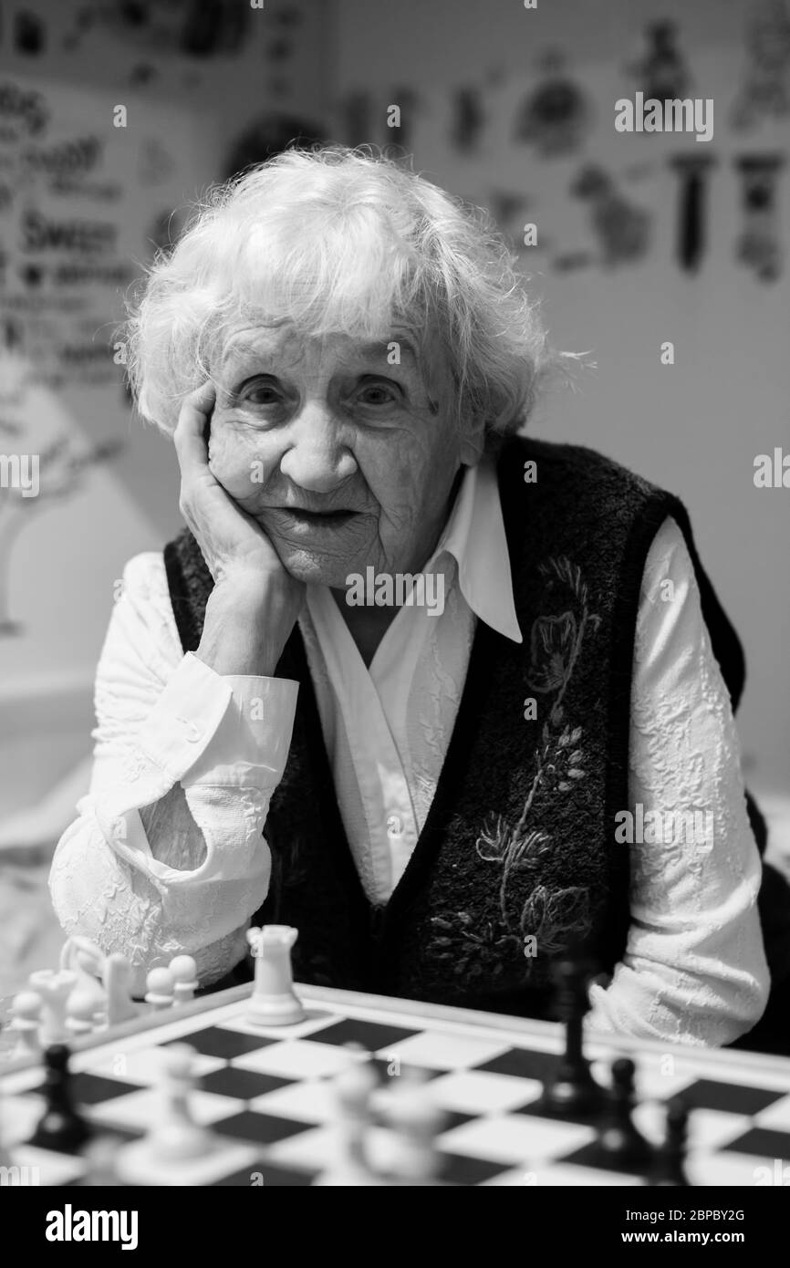 Woman playing old grandson Black and White Stock Photos & Images - Alamy