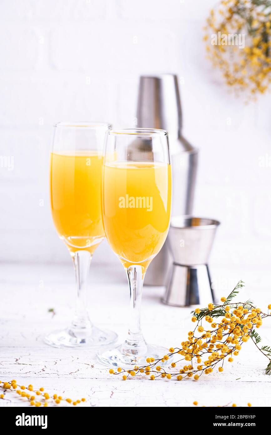 Mimosa cocktail with orange juice Stock Photo - Alamy