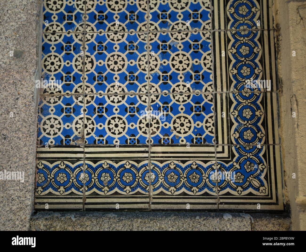 Traditional old tiles wall on the Porto streets, painted tin-glazed ...