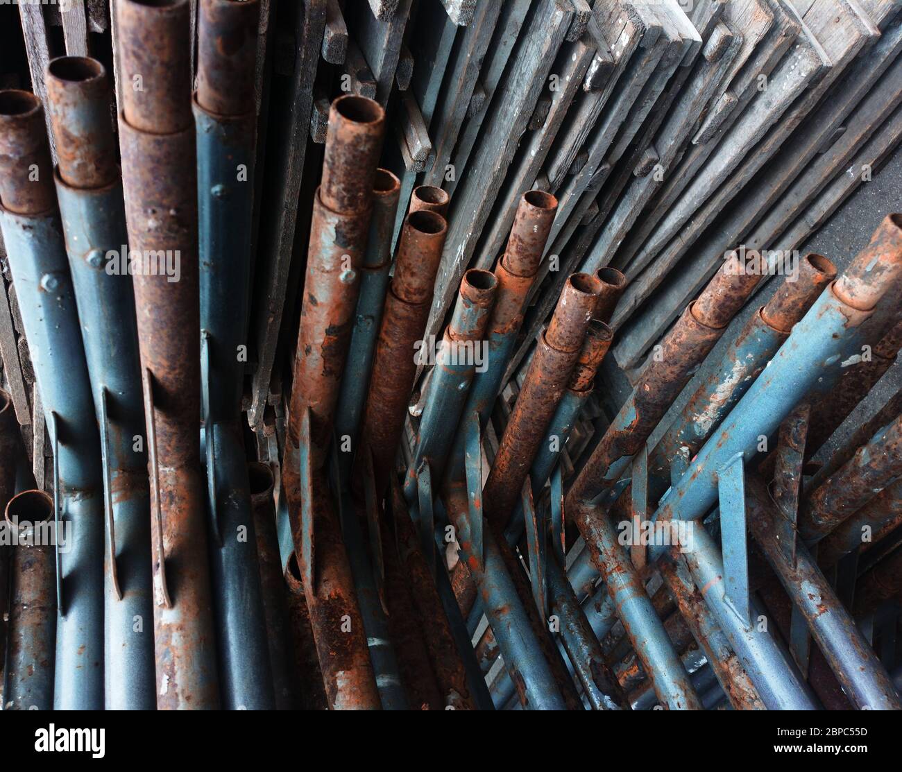 Vintage pipes and fittings construction background Stock Photo - Alamy