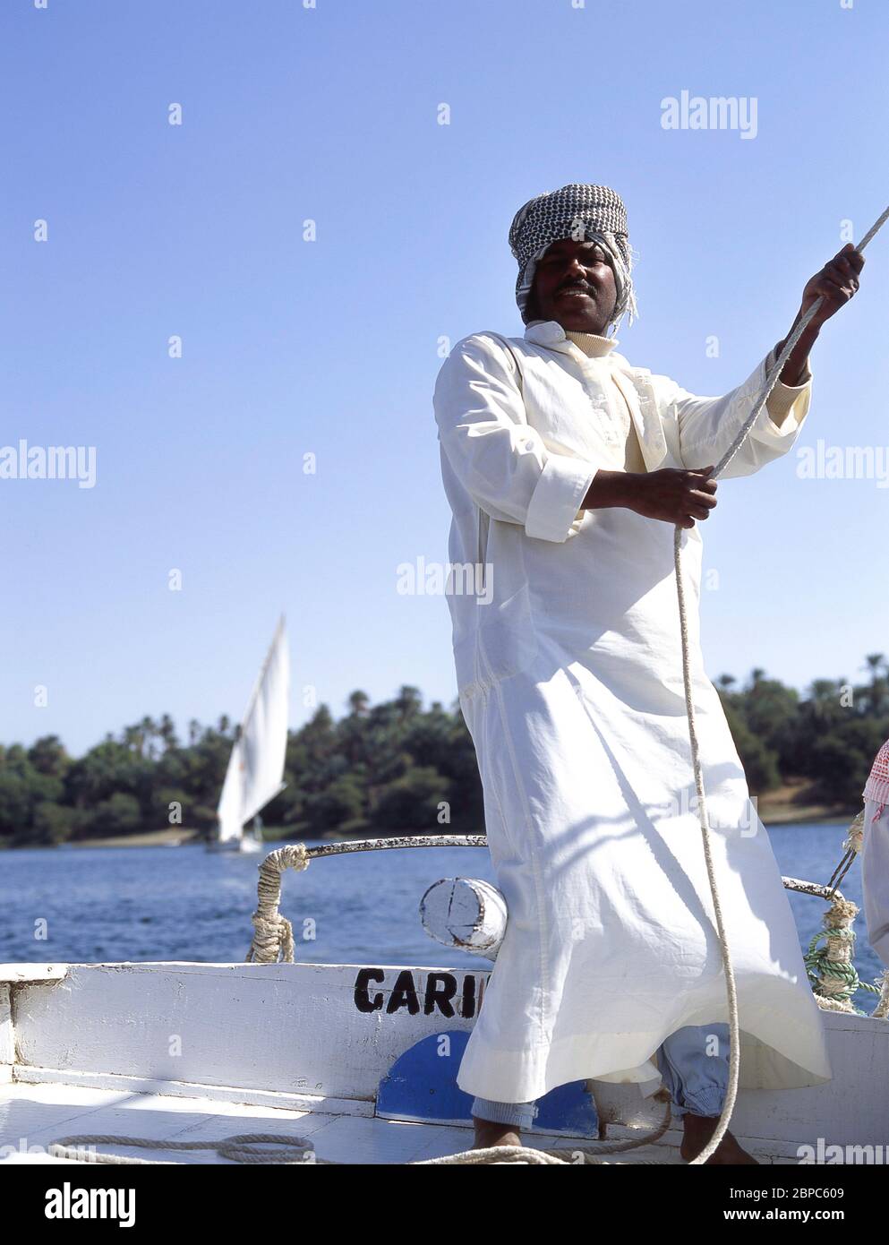 Local felucca sailor on River Nile at Aswan, Aswan Governorate ...