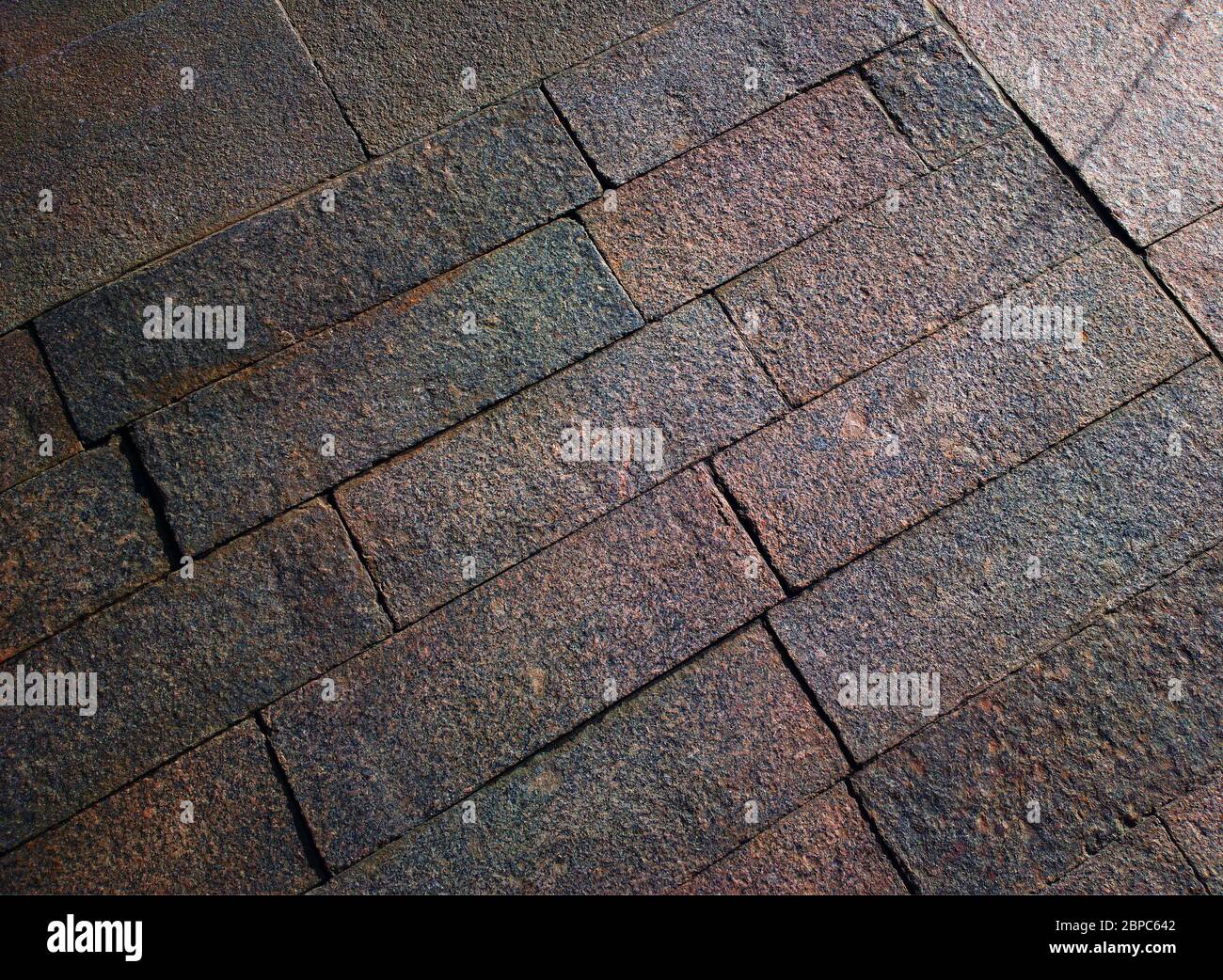 Diagonal pavement street blocks texture background Stock Photo - Alamy