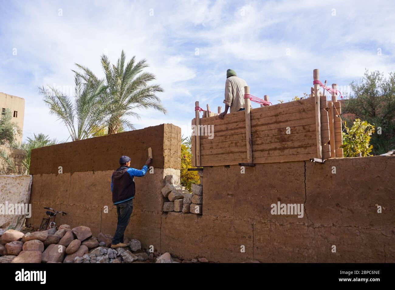 Making of a wall in rammed earth technique in Skoura, Morocco Stock ...