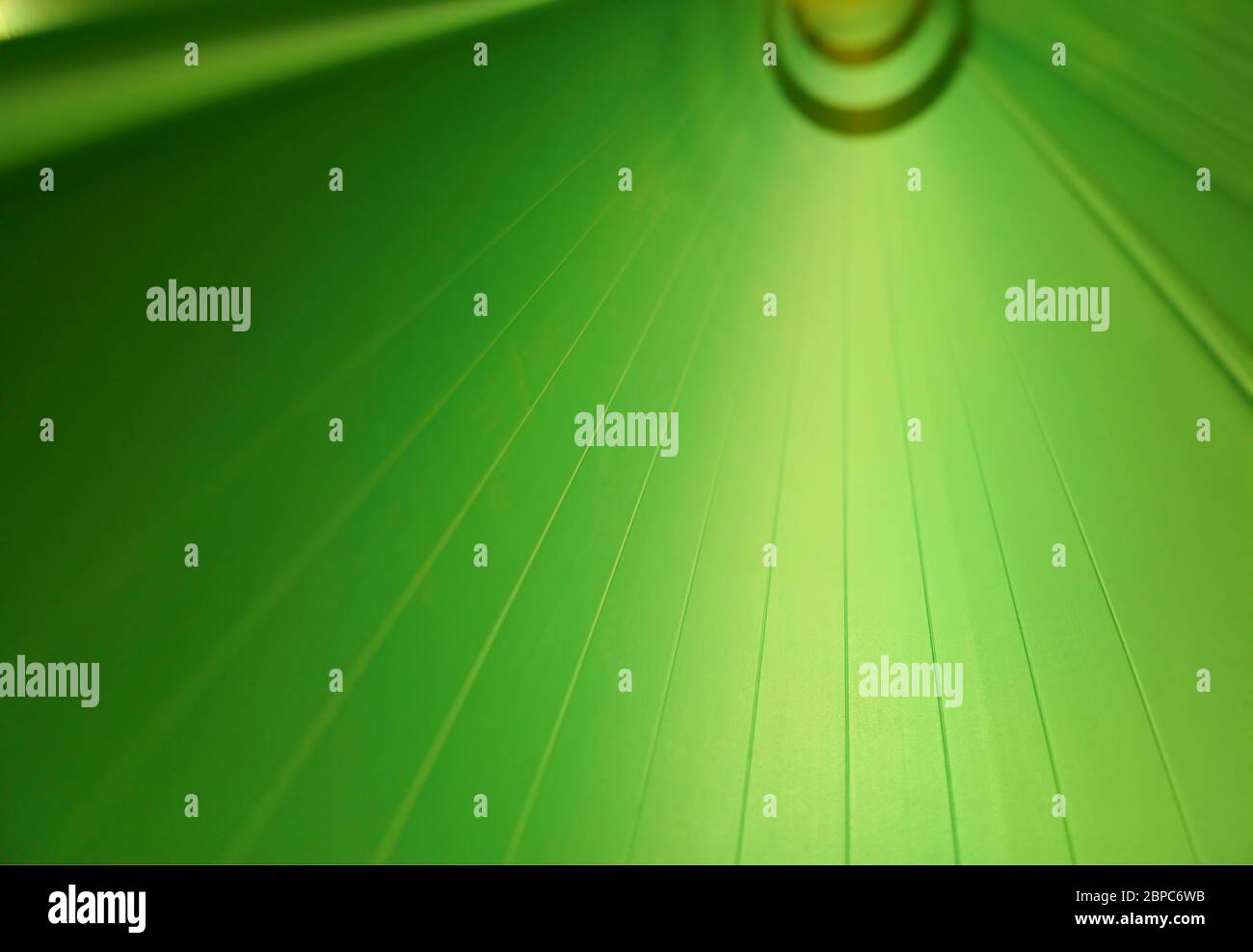 Green gutter metallic pipe background Stock Photo - Alamy