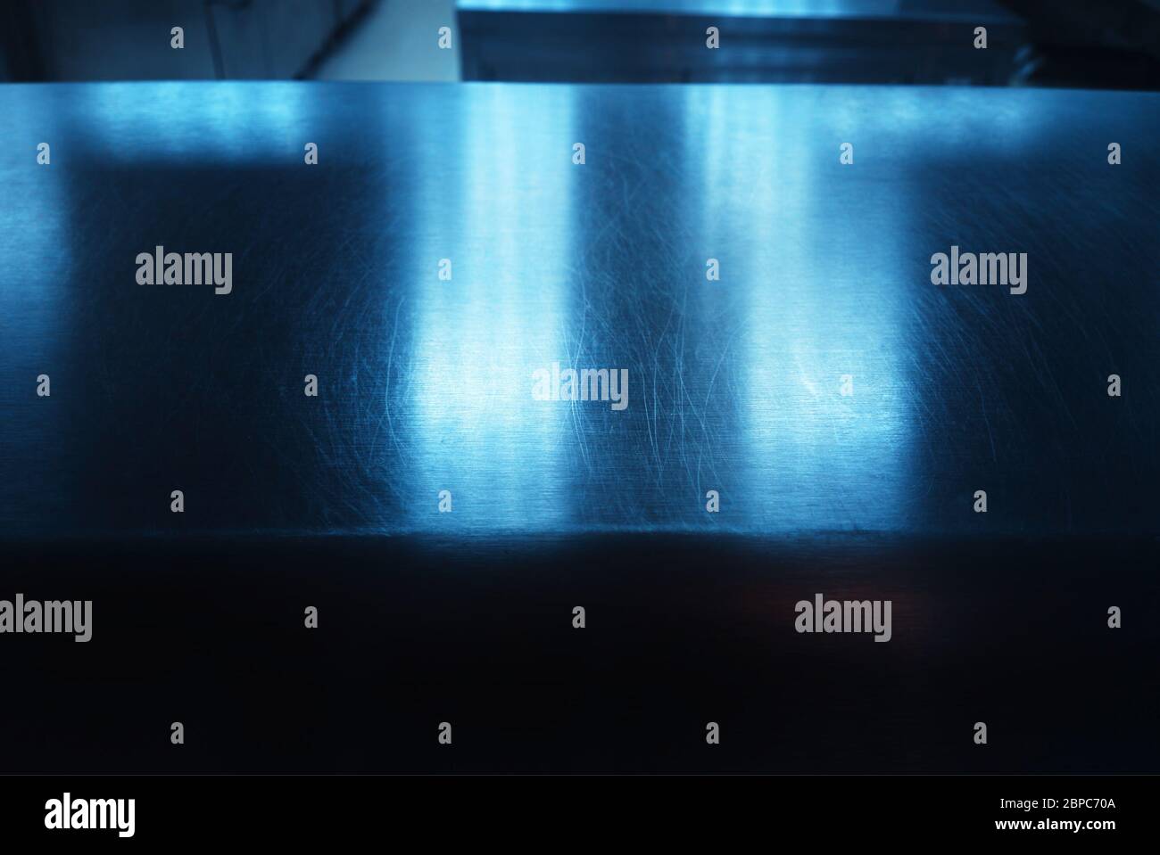 Steel table with scratches bokeh background Stock Photo - Alamy