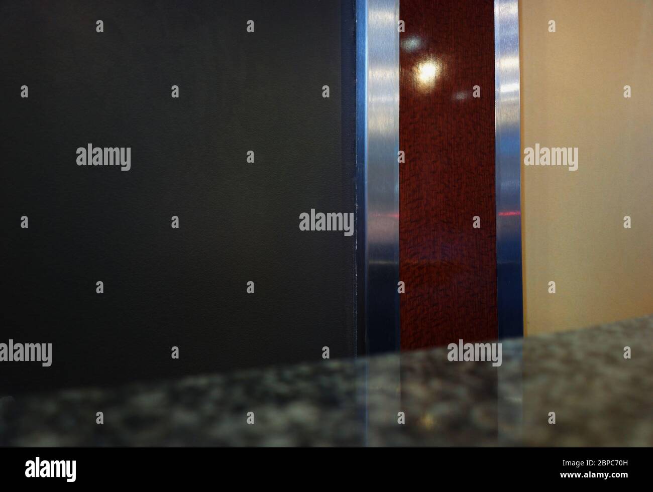 Steel panels and leather wall interior background Stock Photo - Alamy