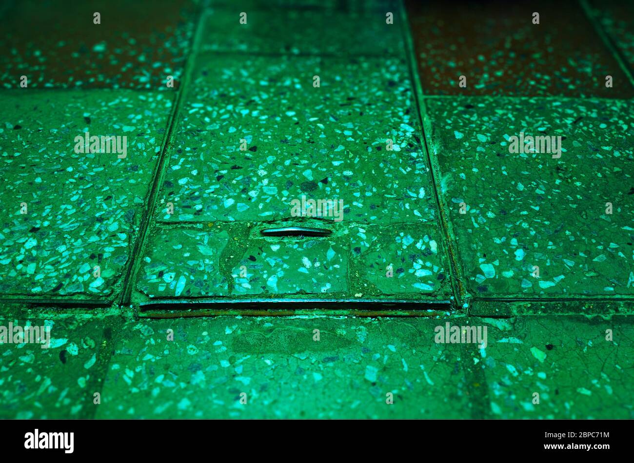 Vintage hatch in concrete floor background Stock Photo - Alamy