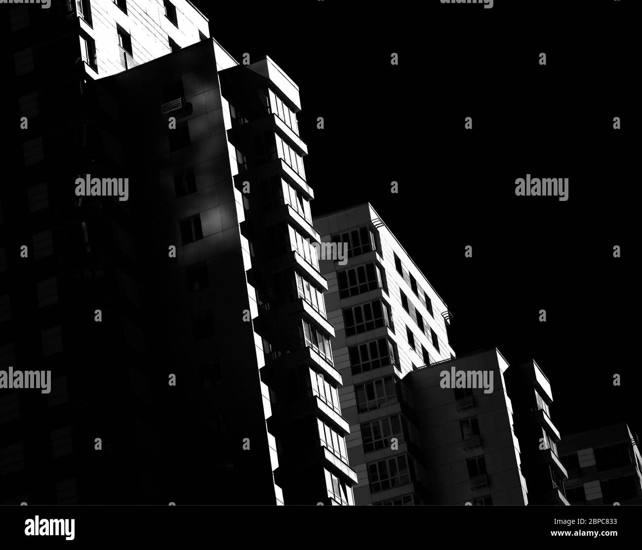 Evil, tilted skyscraper architecture background Stock Photo - Alamy