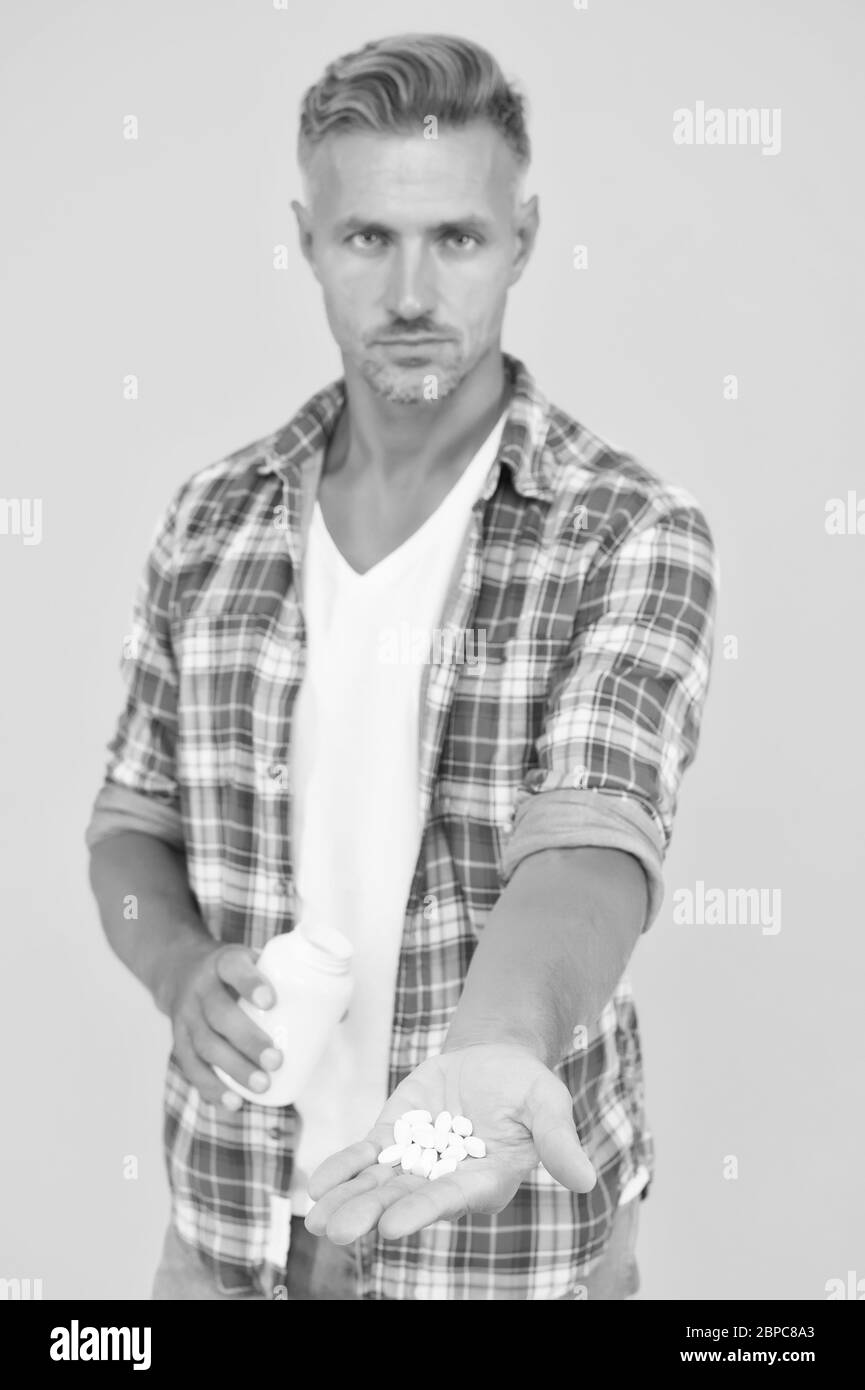 Food additives vitamins male health. Vitamin complex. Handsome man ...