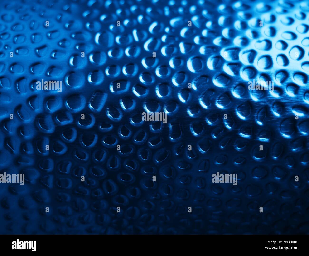 Blue extruded shaped metal texture background Stock Photo - Alamy