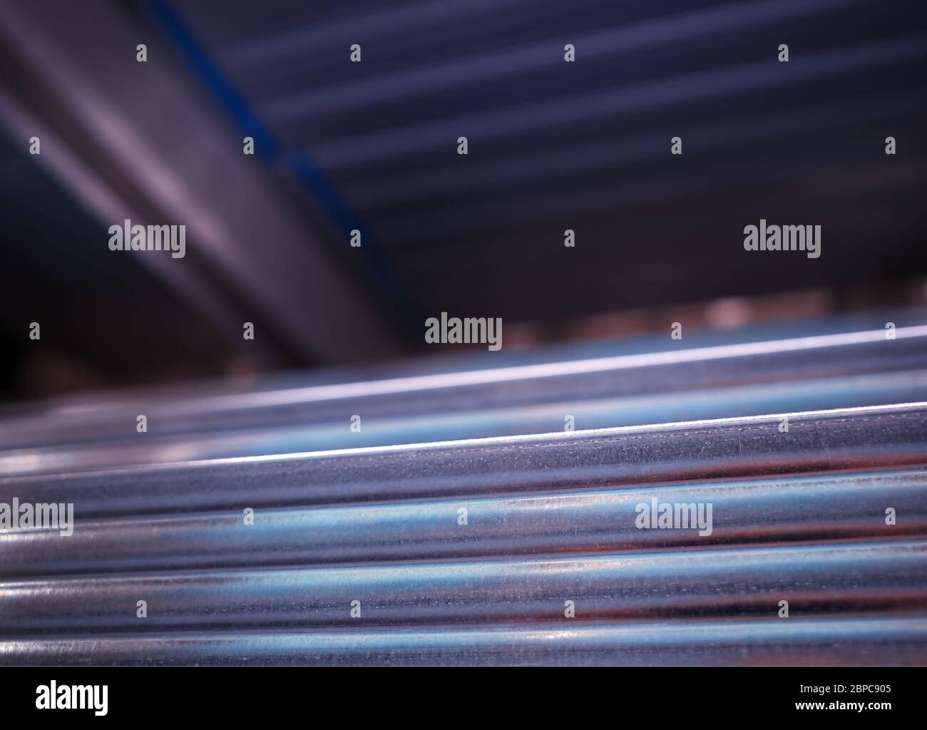 Steel materials at warehouse texture bokeh background Stock Photo - Alamy