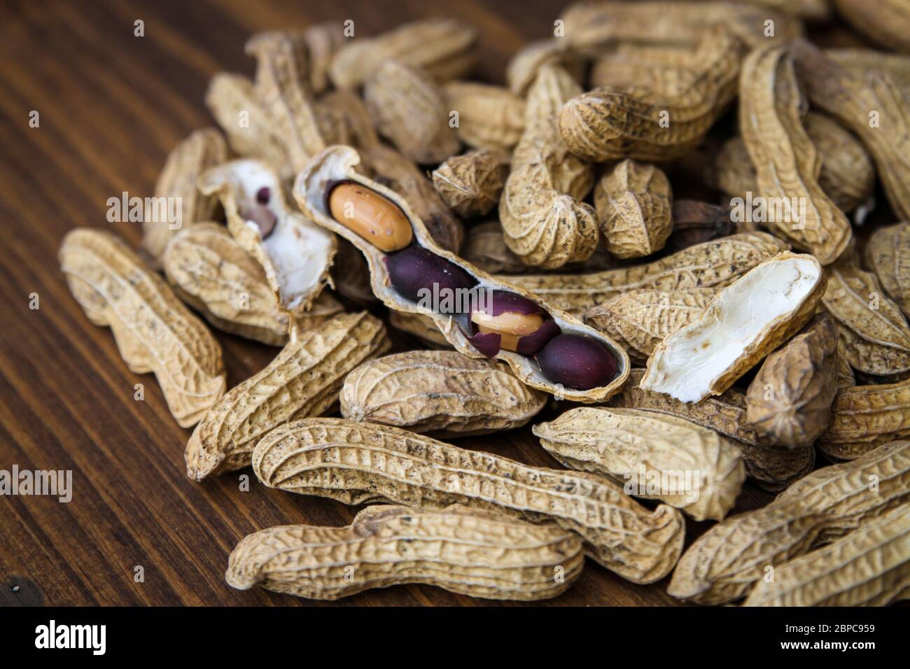 Four peanuts in shell hi-res stock photography and images - Alamy