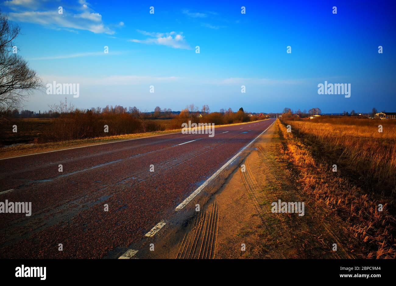 Diagonal sunset road transport background Stock Photo - Alamy