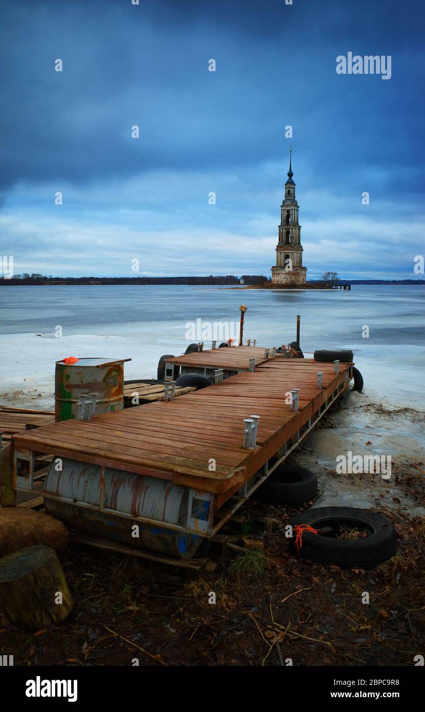 Pier near the bell tower church architecture background Stock Photo - Alamy
