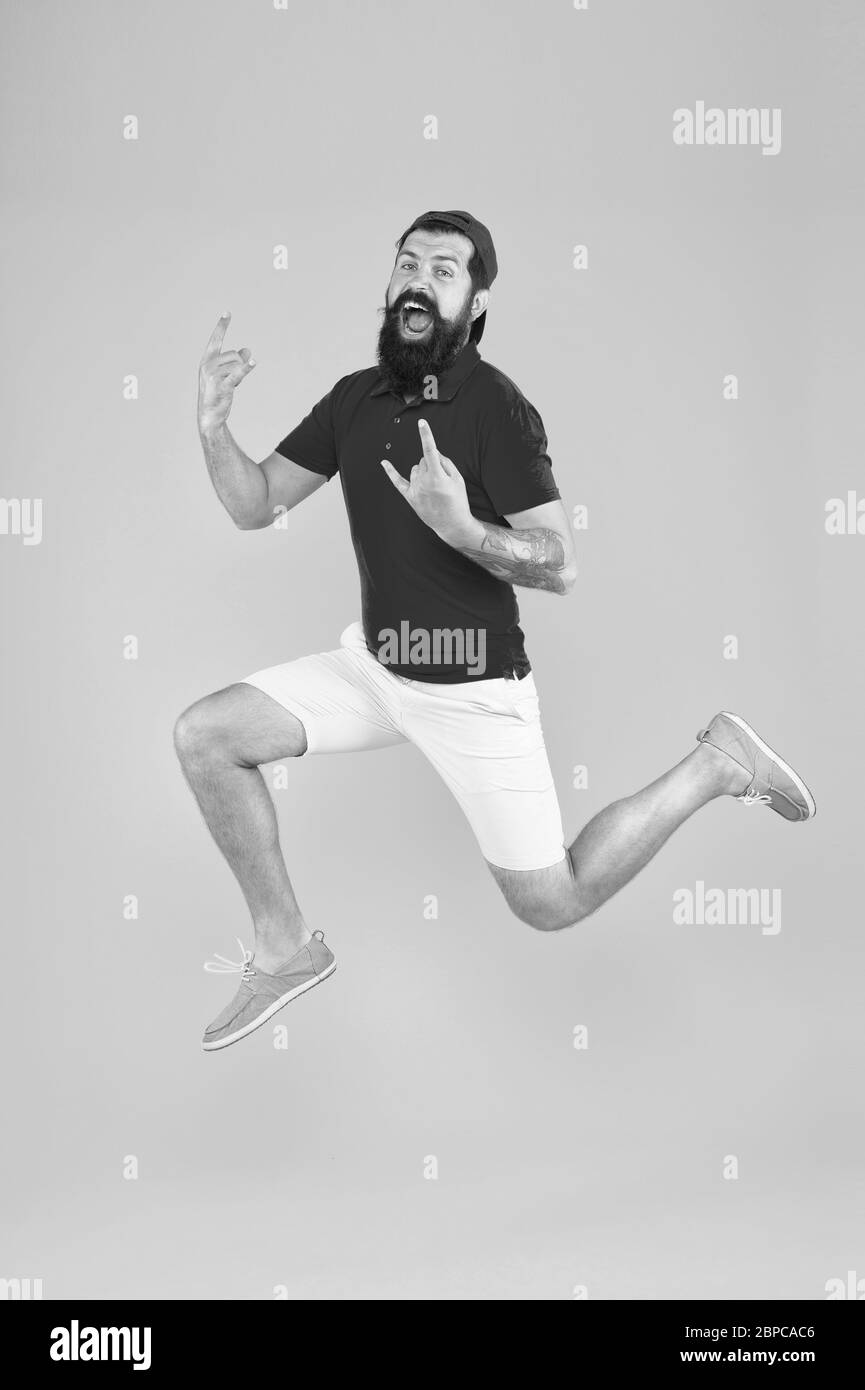 Full of strength and energy. Hipster dancing jumping. Feeling free ...
