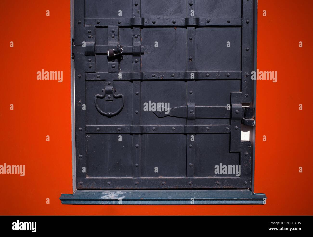 Locked steel window object background Stock Photo - Alamy