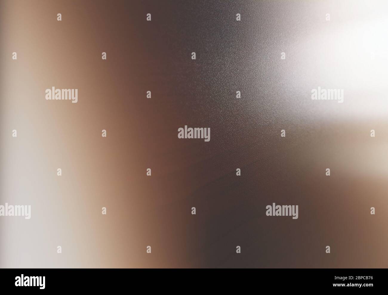 Pale light leak on wood table background Stock Photo - Alamy