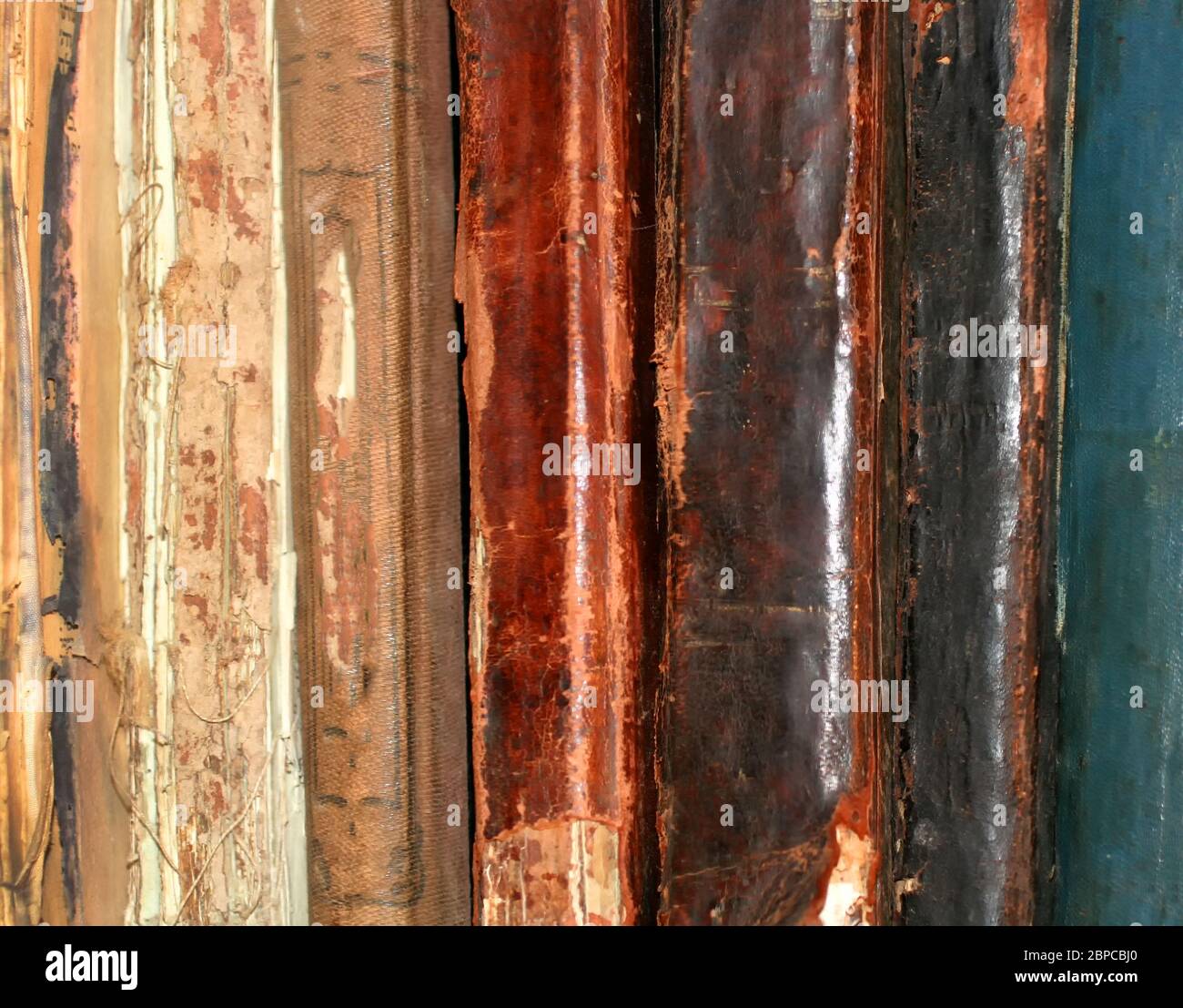 Old torn vintage books. Rare book covers. stack Stock Photo - Alamy