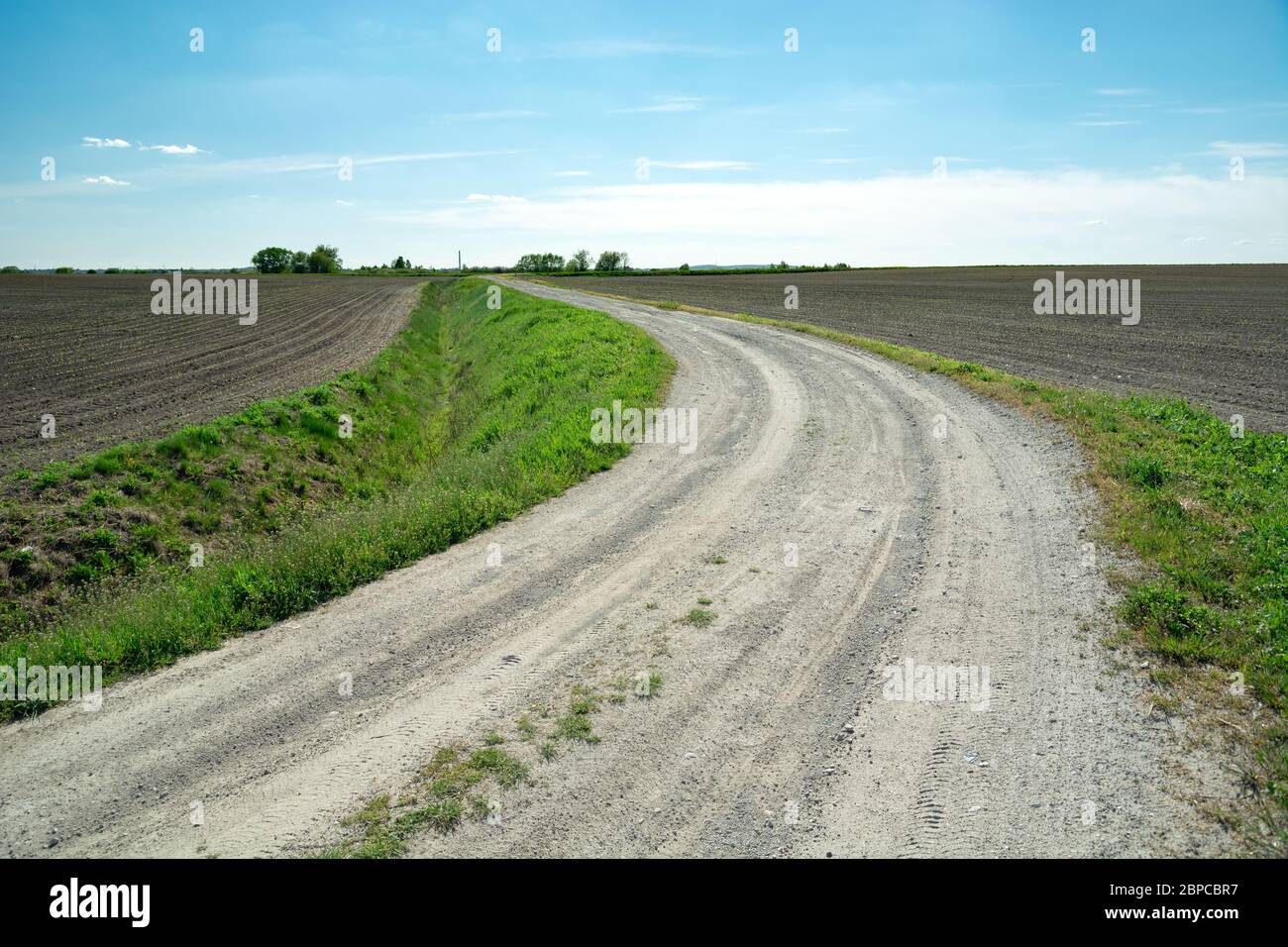 Village road through agriculture land hi-res stock photography and ...
