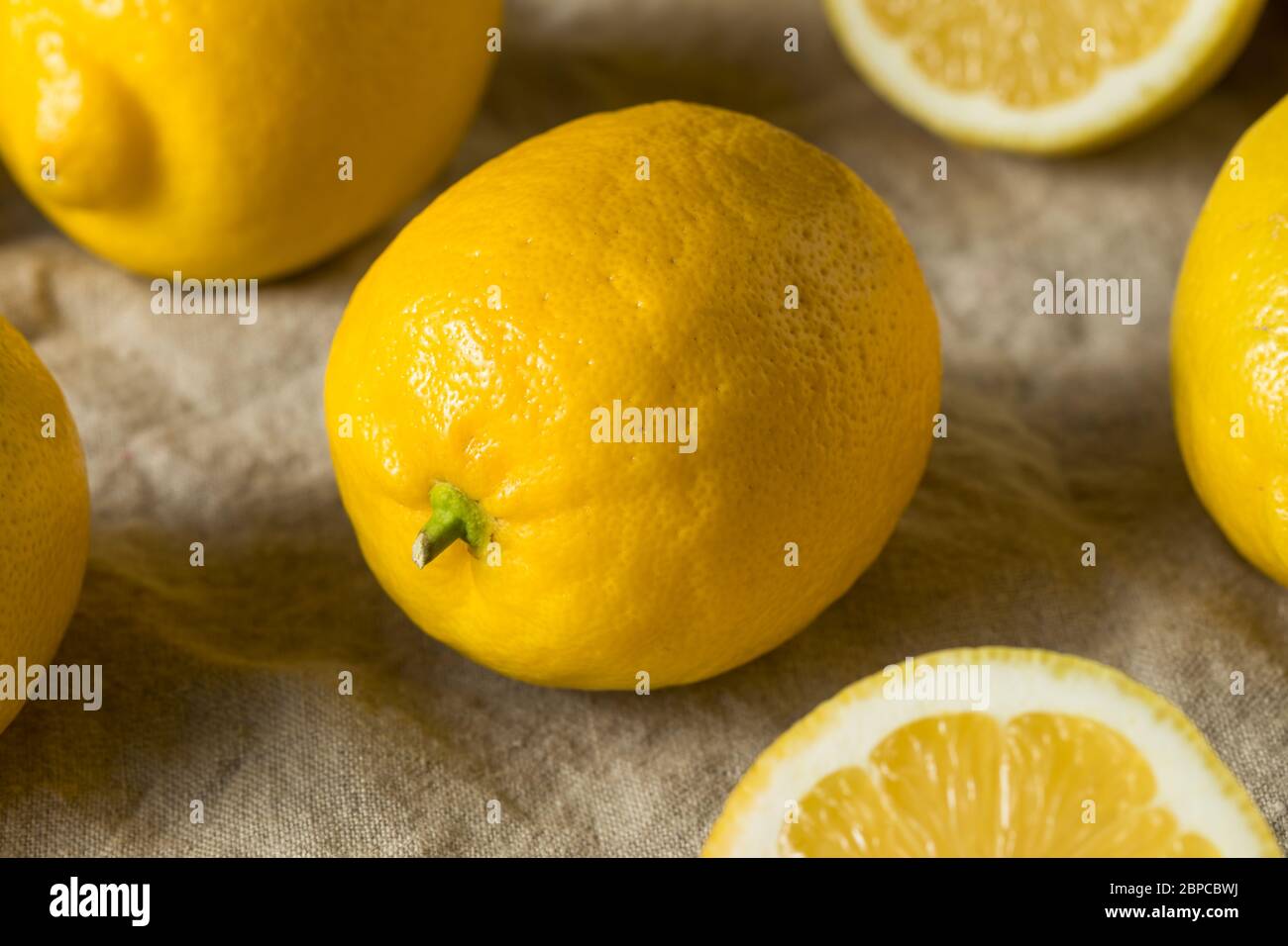 Raw Organic Yellow Lemons in a Bunch Stock Photo - Alamy