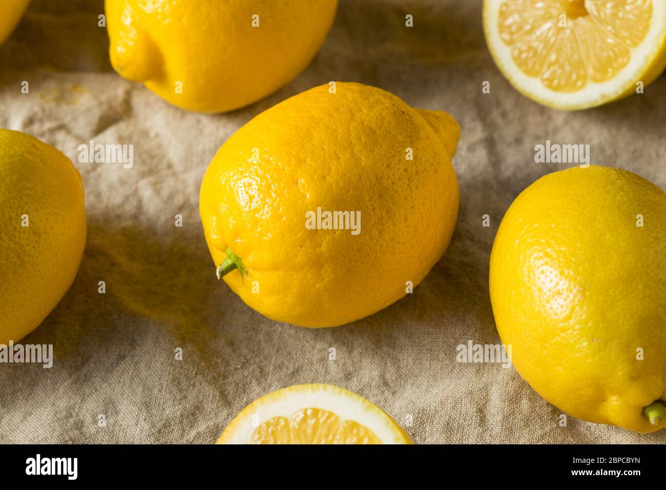 Raw Organic Yellow Lemons in a Bunch Stock Photo - Alamy