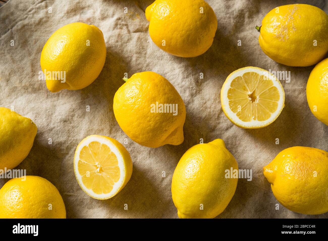 Raw Organic Yellow Lemons in a Bunch Stock Photo - Alamy