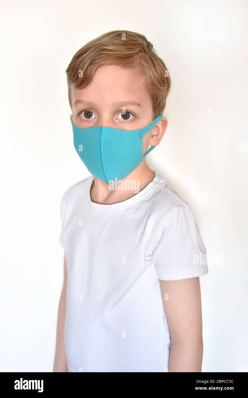 Boy in face mask hi-res stock photography and images - Alamy
