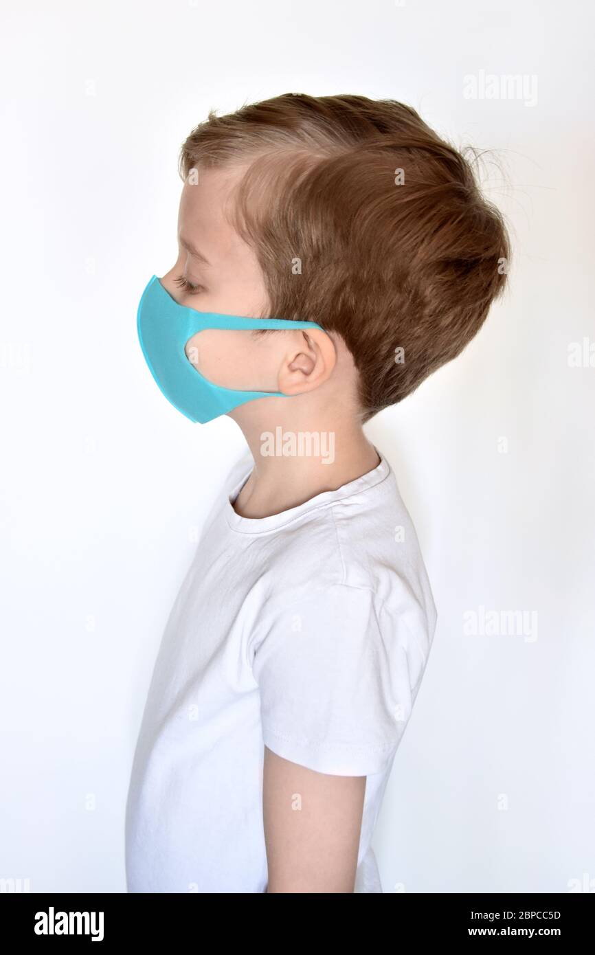 Boy in face mask hi-res stock photography and images - Alamy