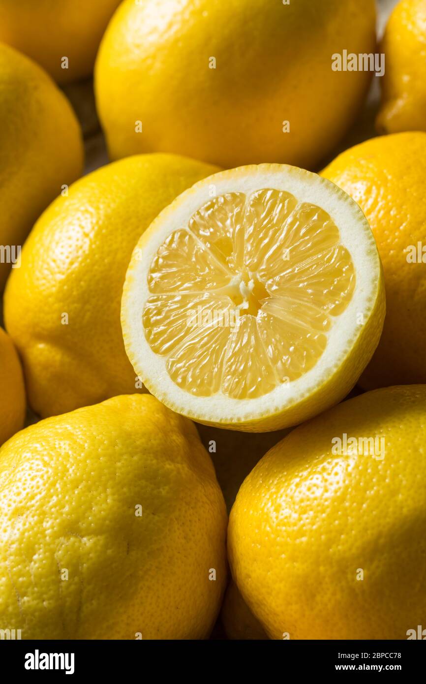 Raw Organic Yellow Lemons in a Bunch Stock Photo - Alamy