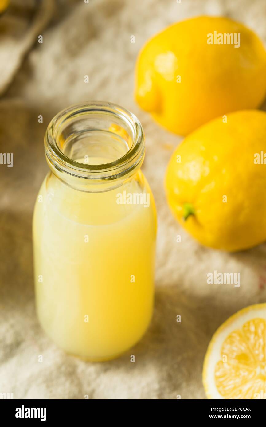 Raw Organic Fresh Lemon Juice Ready to Use Stock Photo - Alamy
