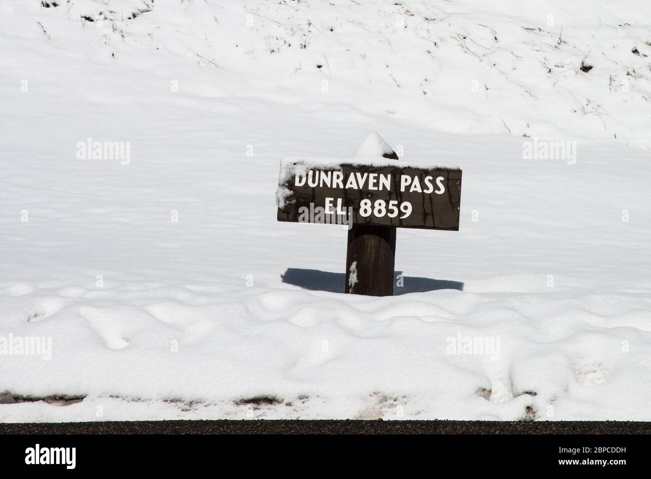 Elevation sign on top of Dunraven Pass, Yellowstone National Park, USA ...