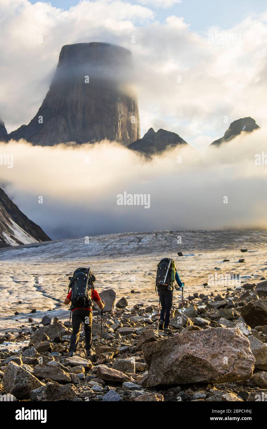 Two climbers en route to climb Mount Asgard, Baffin Island Stock Photo ...