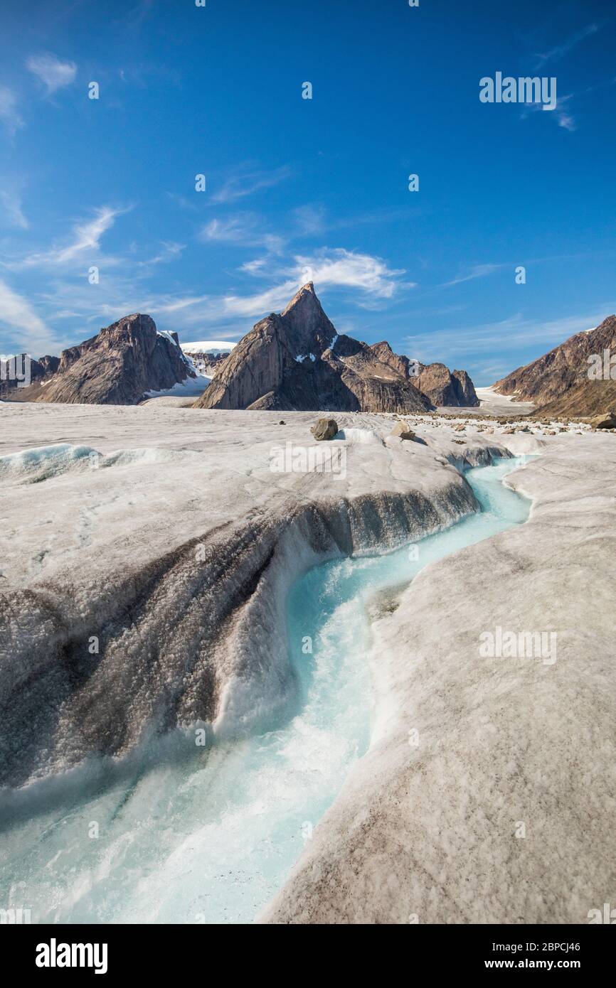 River meanders through a glacier below Mount Loki, Baffin Island Stock ...