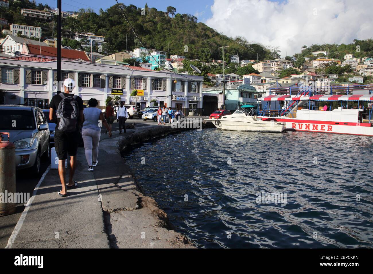 St George's Grenada Carenage Harbour People walking along Waterfront ...