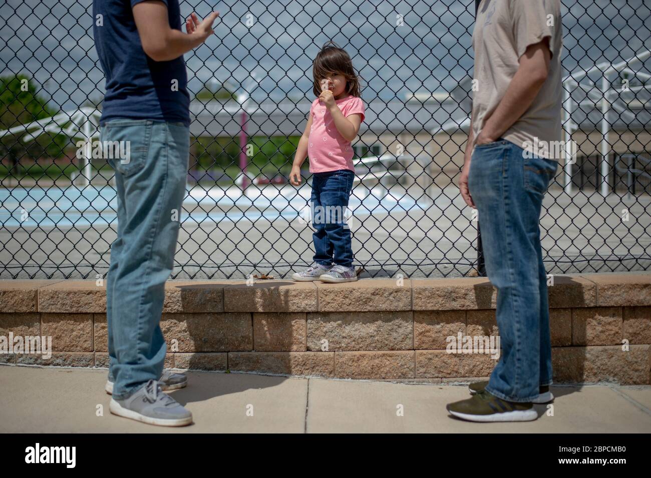 Manhattan, Kansas, USA. 17th May, 2020. MAIYA GONZALEZ, 2.5, stands at ...