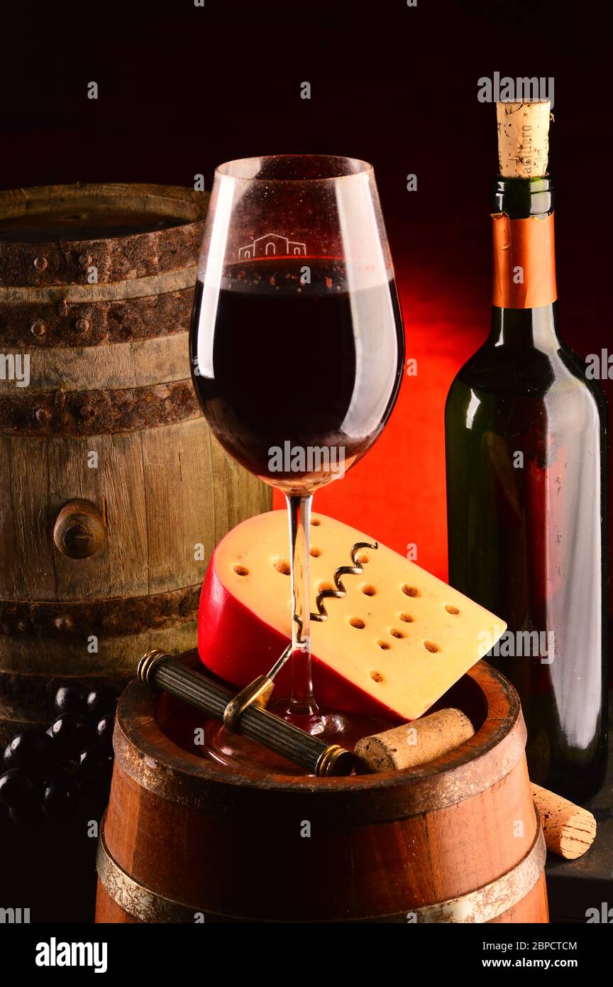 Glass and wine bottle on a studio shot Stock Photo - Alamy