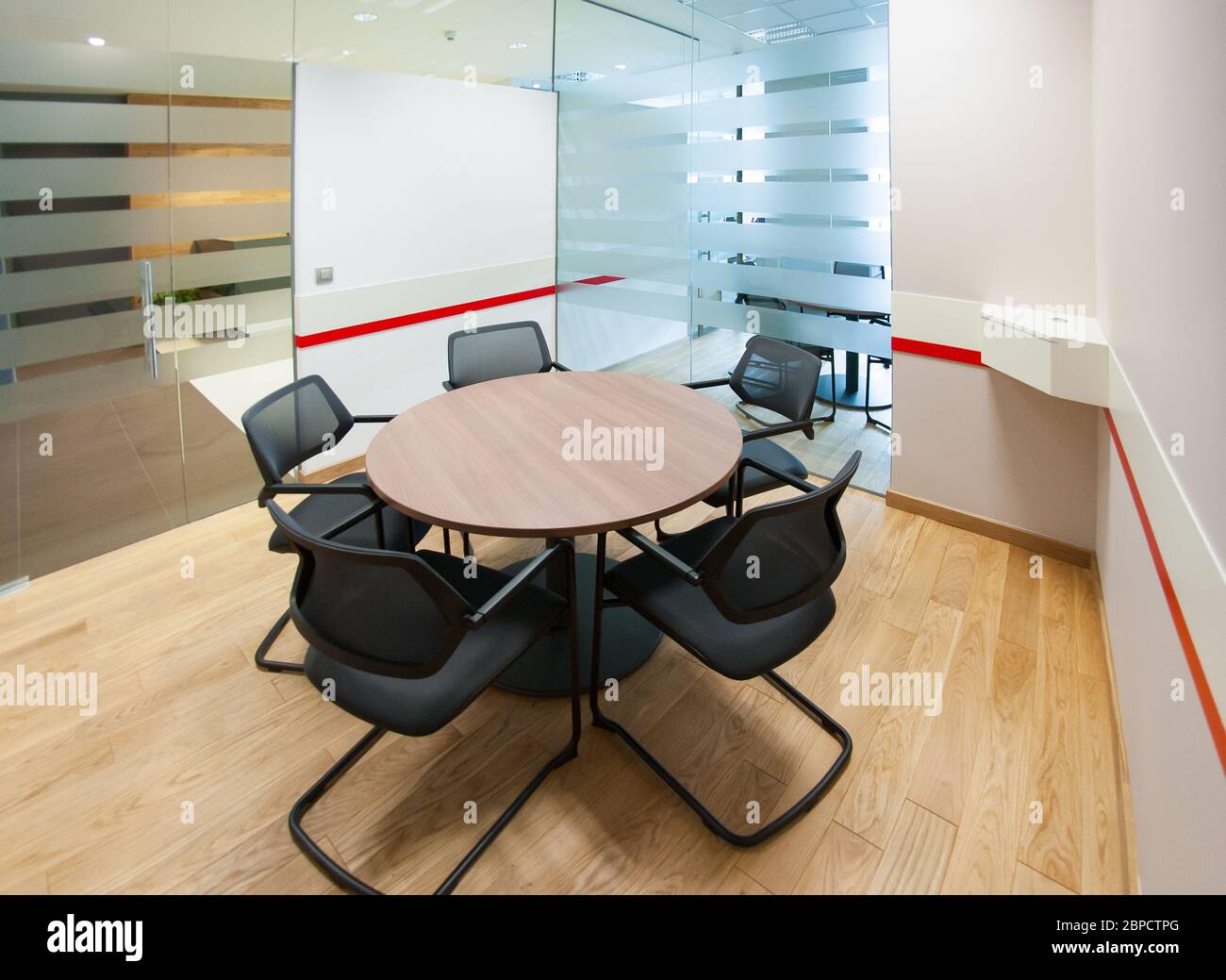 Empty small meeting room. Bright modern interior. Glass walls Stock ...