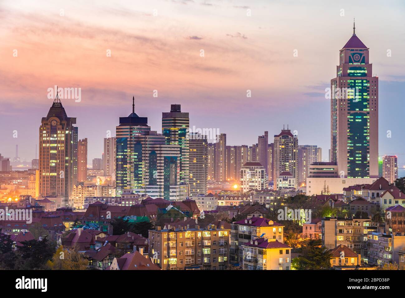 QINGDAO, CHINA - NOVEMBER 12: This is an evening view of city buildings ...