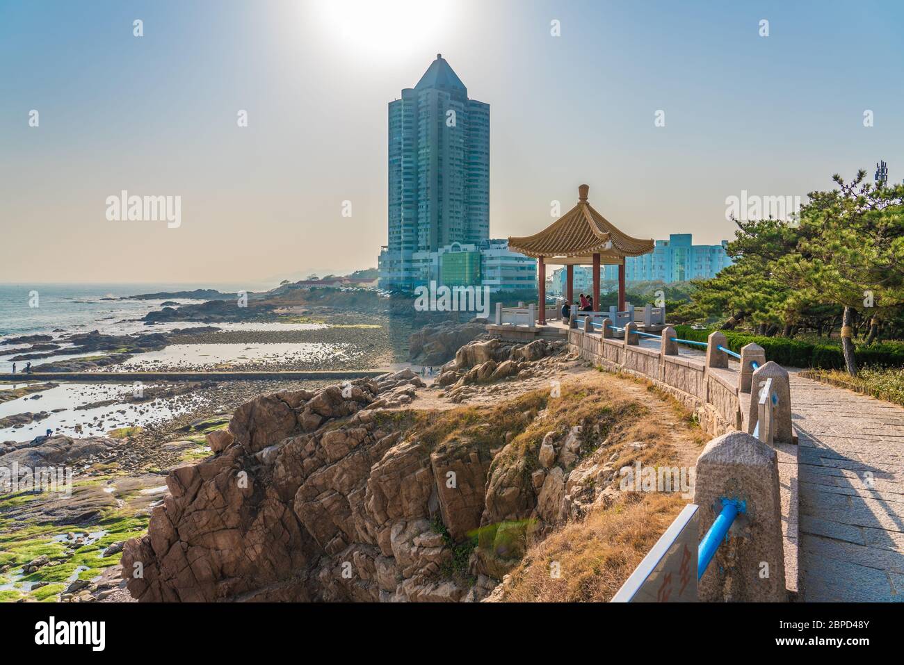 QINGDAO, CHINA - NOVEMBER 15: View of a Chinese pavilion on a cliff at ...
