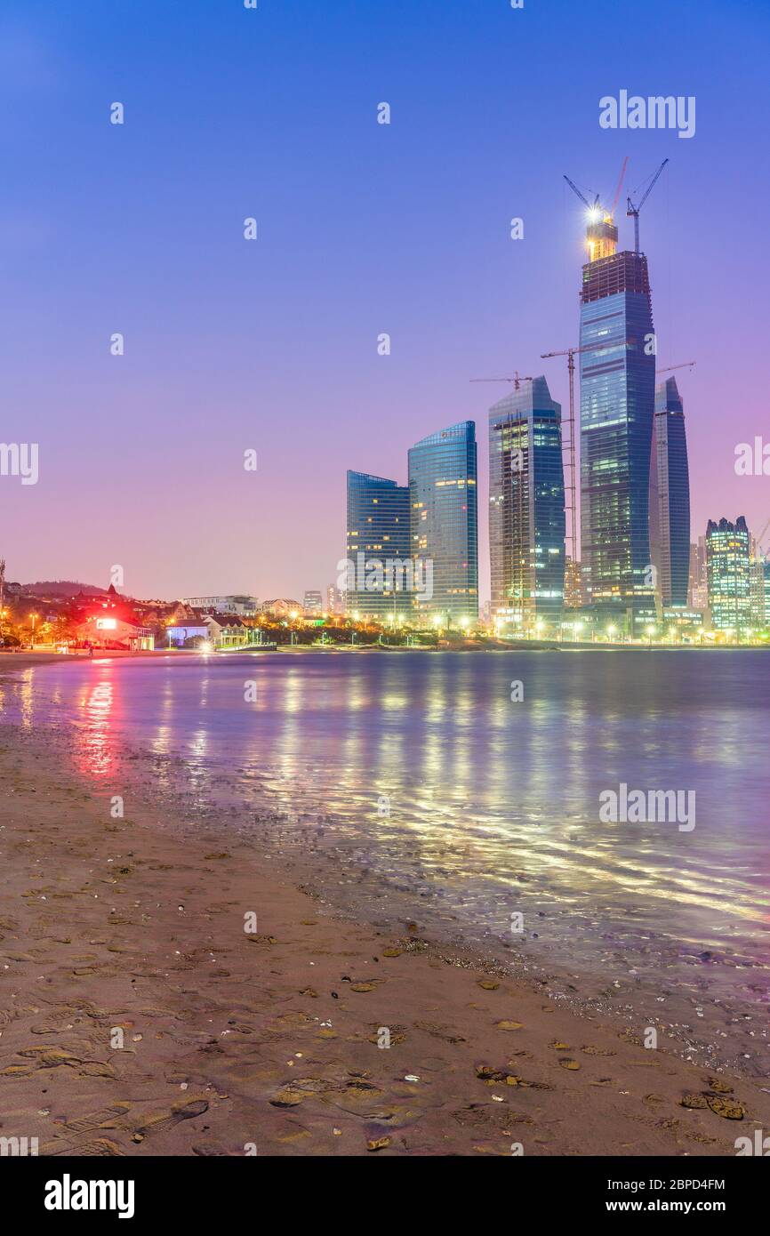 QINGDAO, CHINA - NOVEMBER 15: This is a night view of a beach with high ...